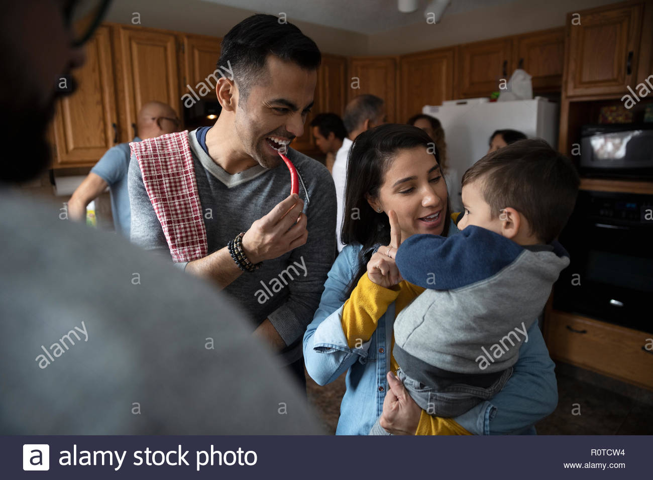 Real latino family kitchen cooking hi-res stock photography and images ...