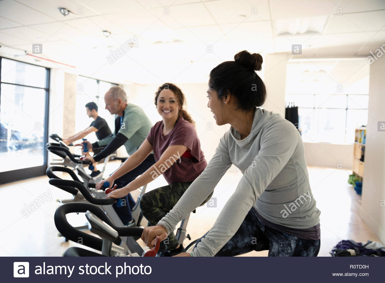 Gym man woman mature bike hi-res stock photography and images - Alamy