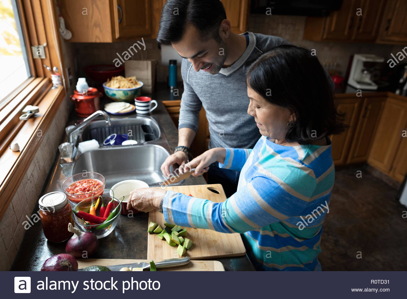 Man cooking kitchen hi-res stock photography and images - Alamy