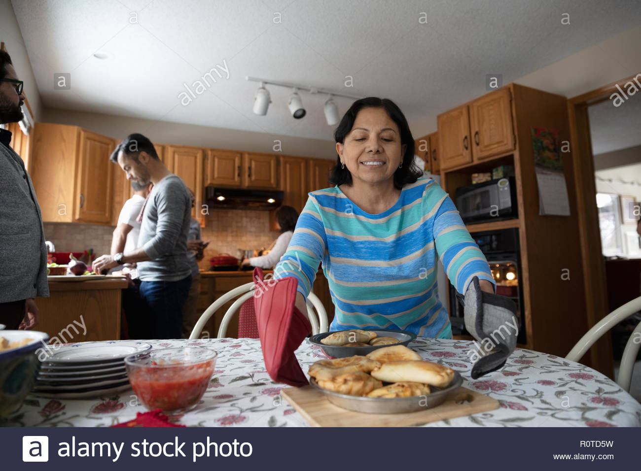 Woman dinner table hi-res stock photography and images - Alamy