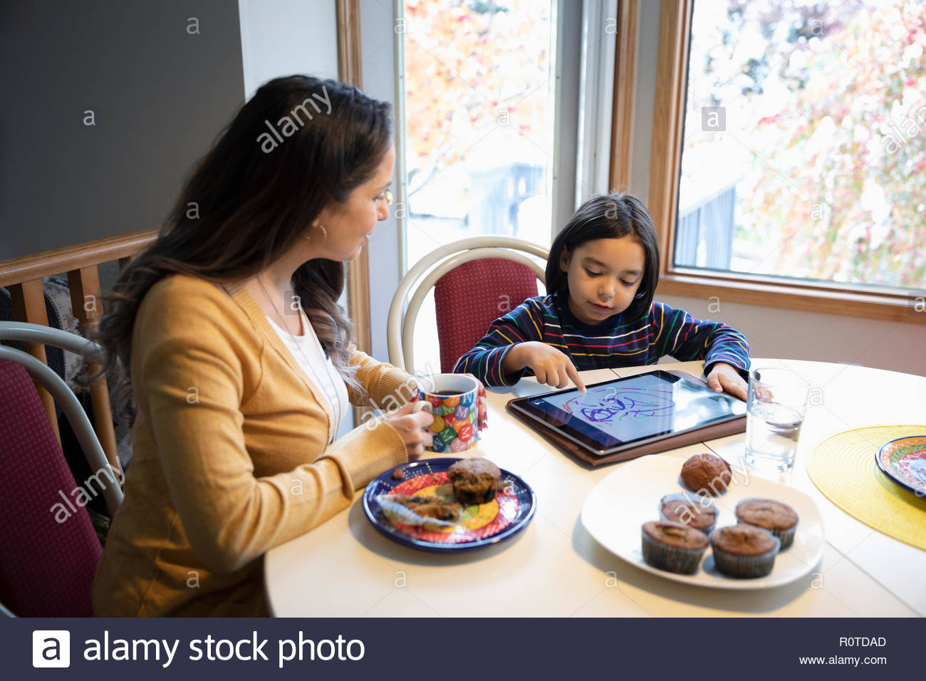 Child watching a tablet hi-res stock photography and images - Alamy