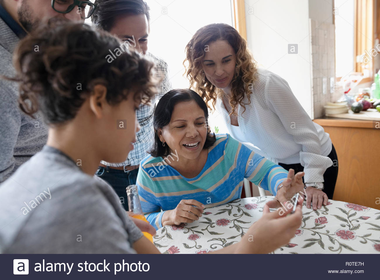 Family phone dining table hi-res stock photography and images - Alamy