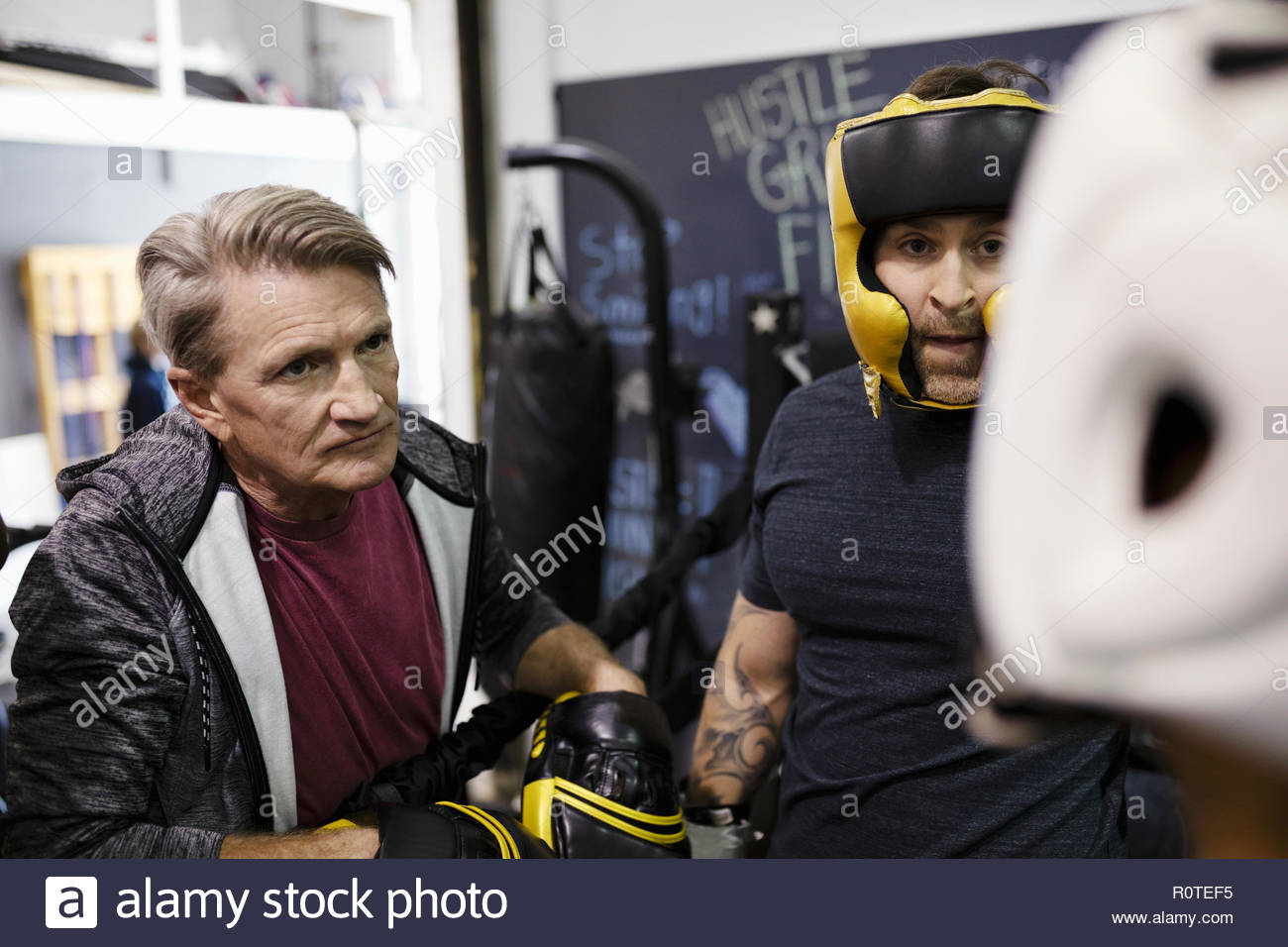 Boxer training coach in ring hi-res stock photography and images - Alamy