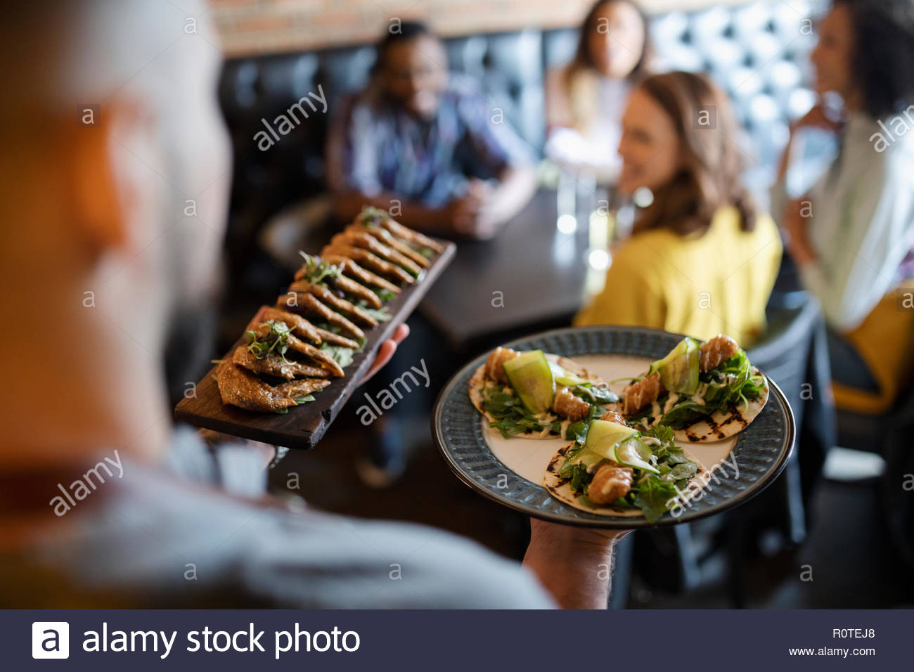 Waiter woman bar hi-res stock photography and images - Alamy