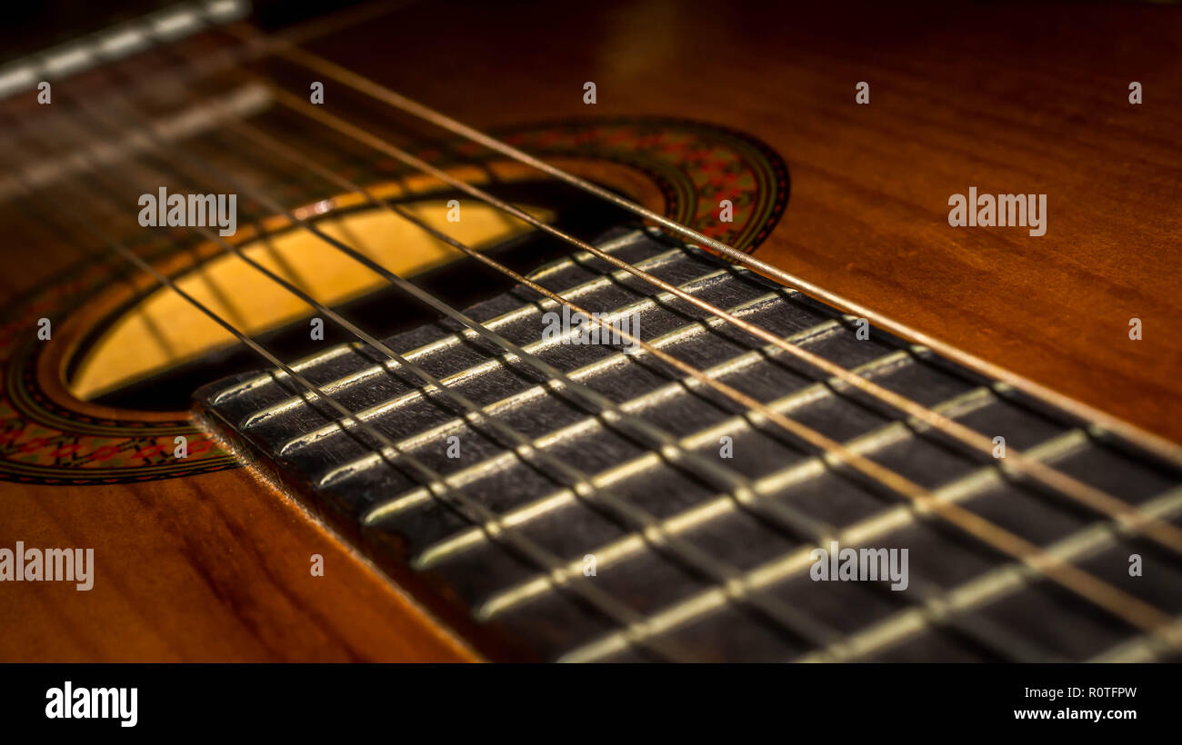 closeup of brown acoustic guitar. art and music background Stock Photo ...