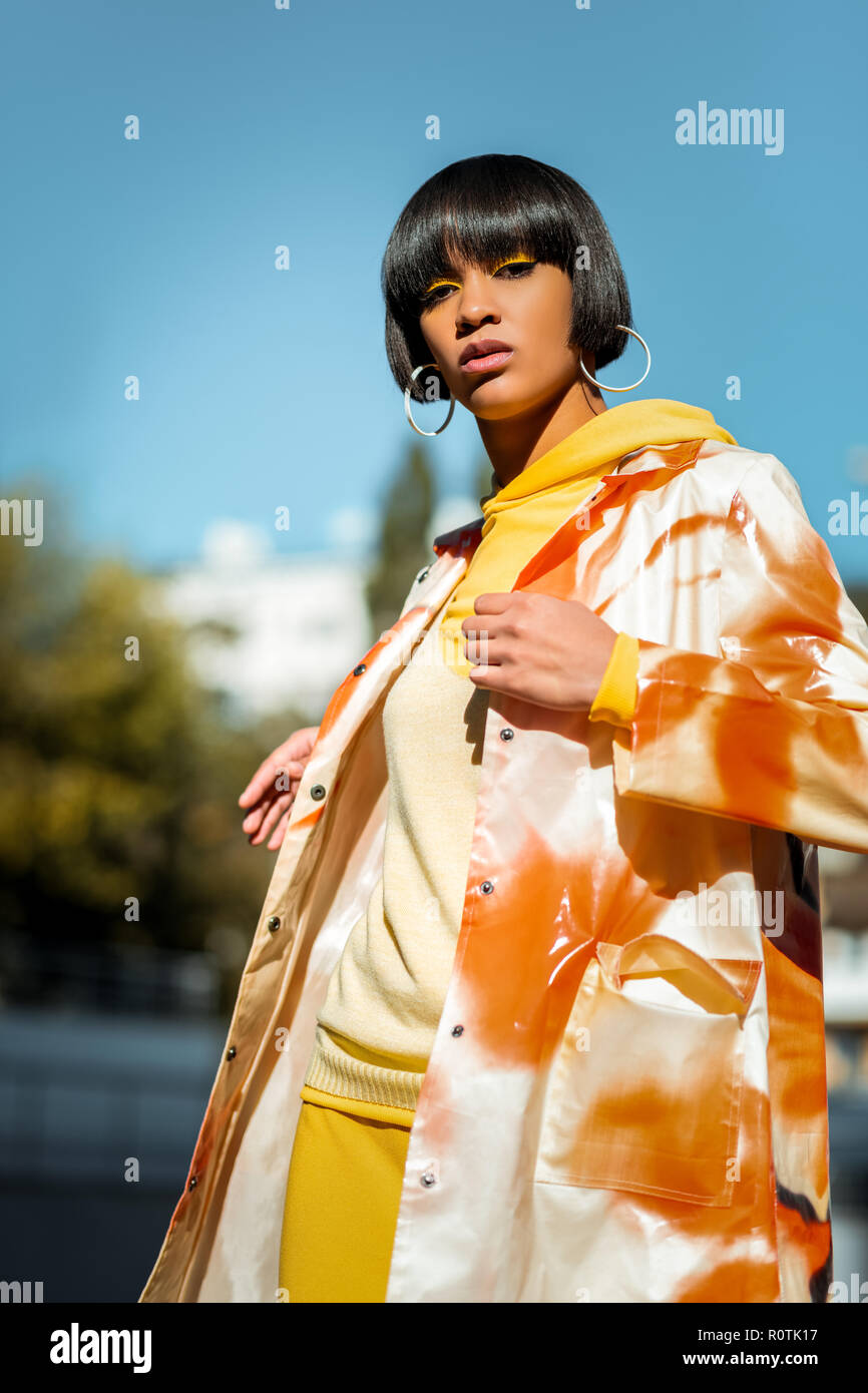 Young short-haired model making photos for magazine Stock Photo - Alamy