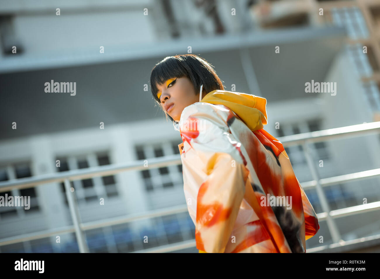 Haughty lady with bob hairstyle looking down Stock Photo - Alamy