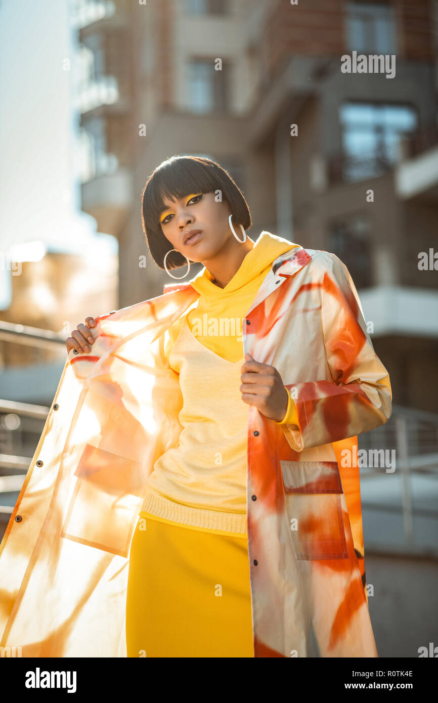 Short-haired extraordinary woman under covering her robe Stock Photo ...