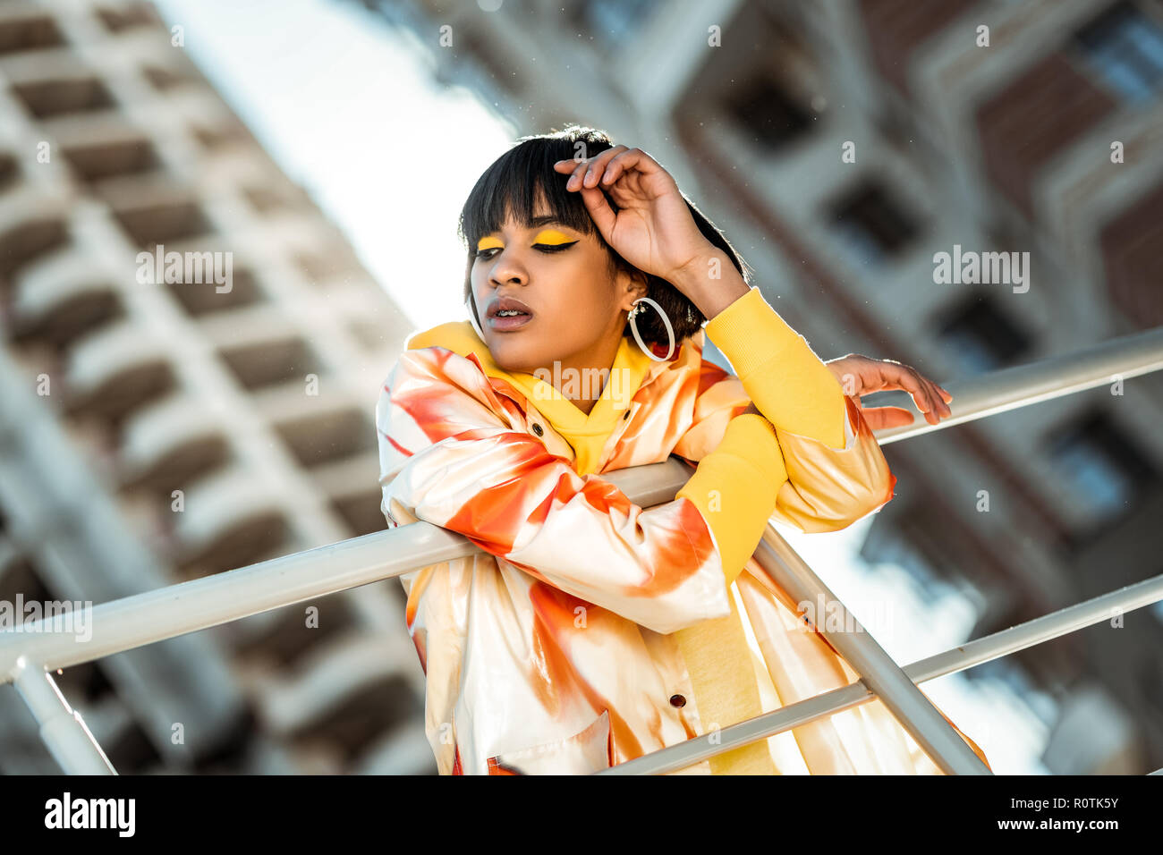 Woman wearing yellow eyeshadow hi-res stock photography and images - Alamy