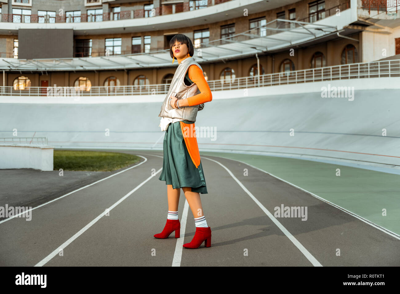 Atypical attractive woman showing her unusual outfit Stock Photo - Alamy