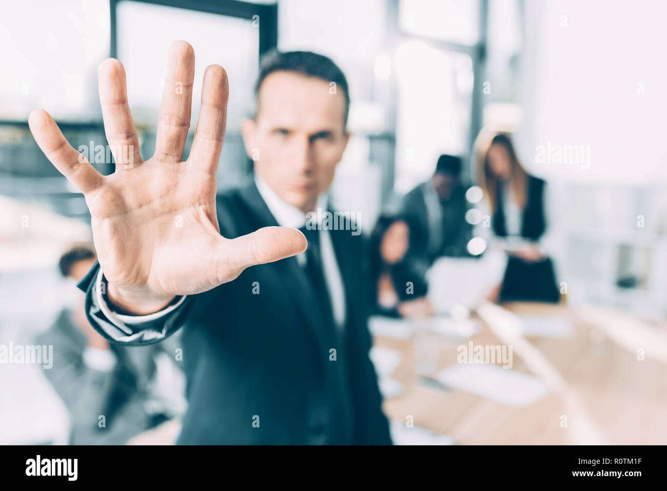 close-up shot of caucaisan businessman showing stop sign Stock Photo ...