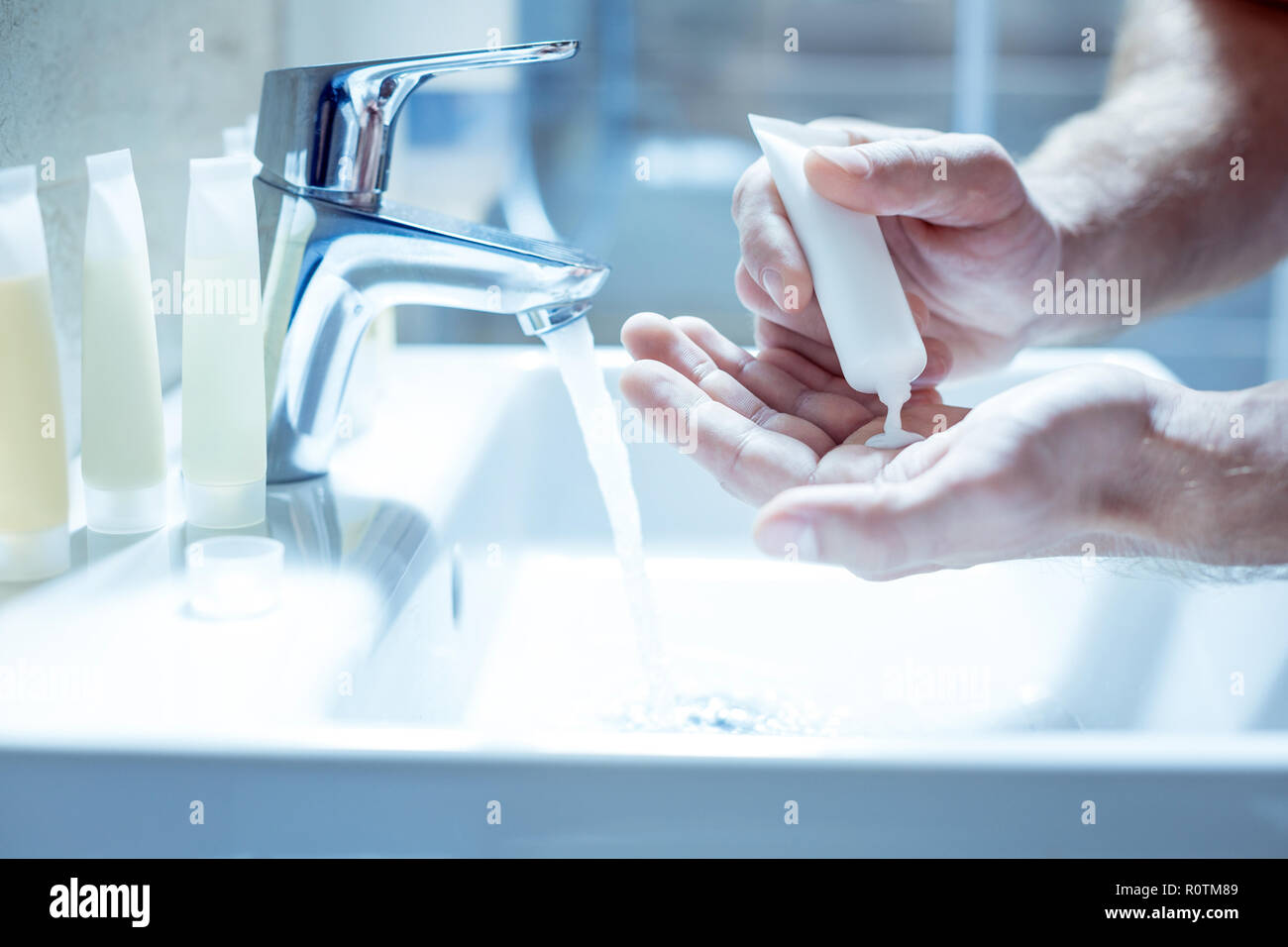 Man washing face with soap hi-res stock photography and images - Alamy