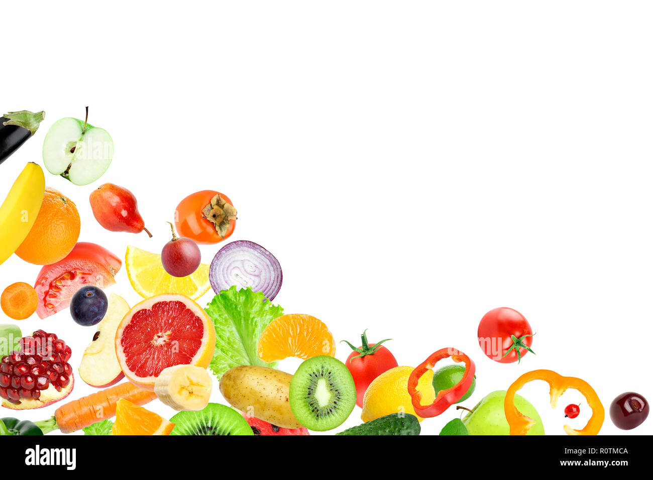 Falling of fruits and vegetables on white background. Healthy food ...