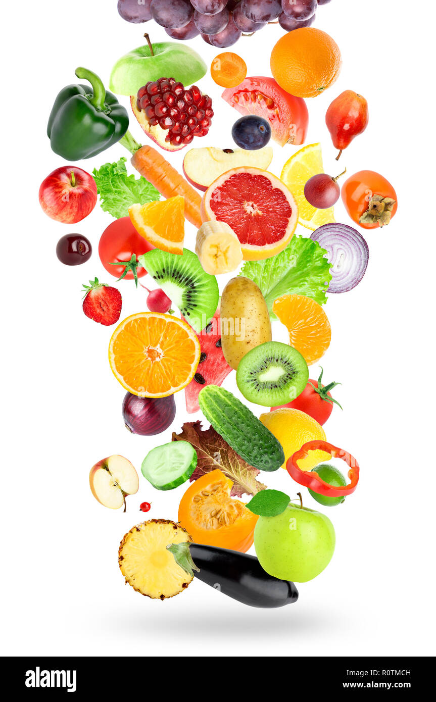 Falling of fruits and vegetables on white background. Healthy food ...