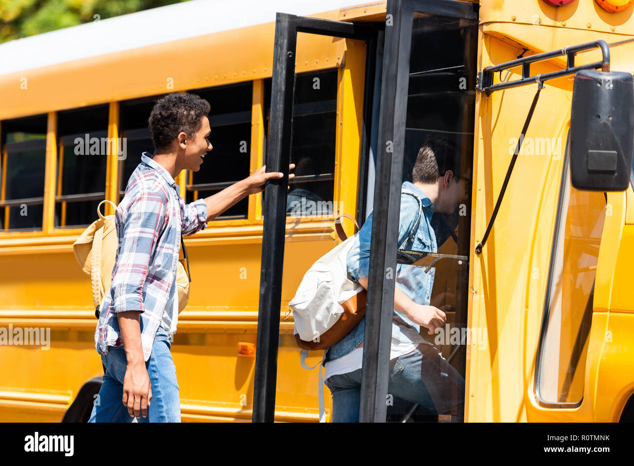 Multicultural school bus hi-res stock photography and images - Alamy
