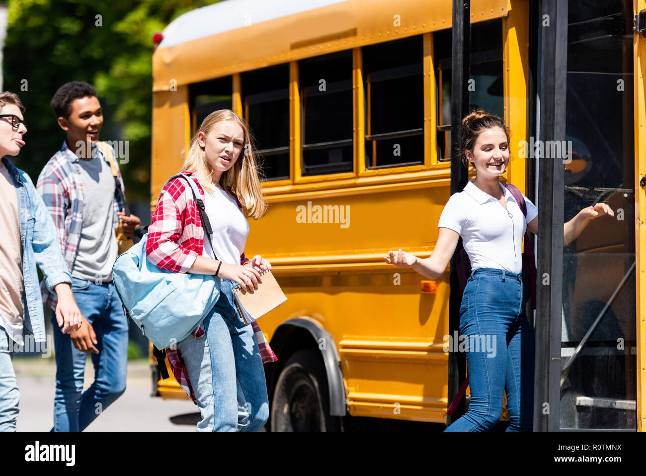 Boys entering school hi-res stock photography and images - Alamy