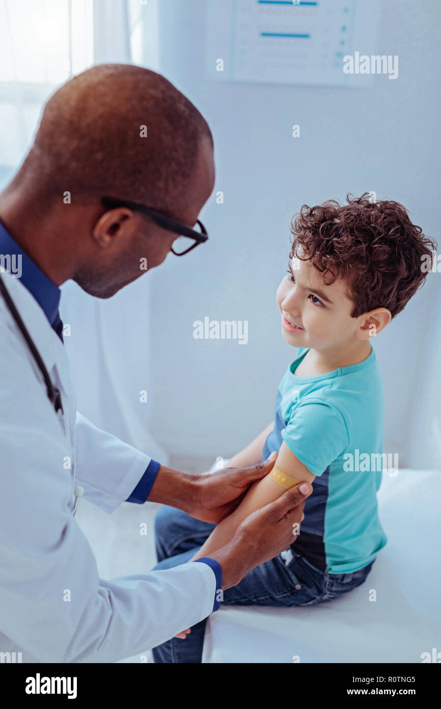 Top view of a cute happy boy smiling Stock Photo - Alamy