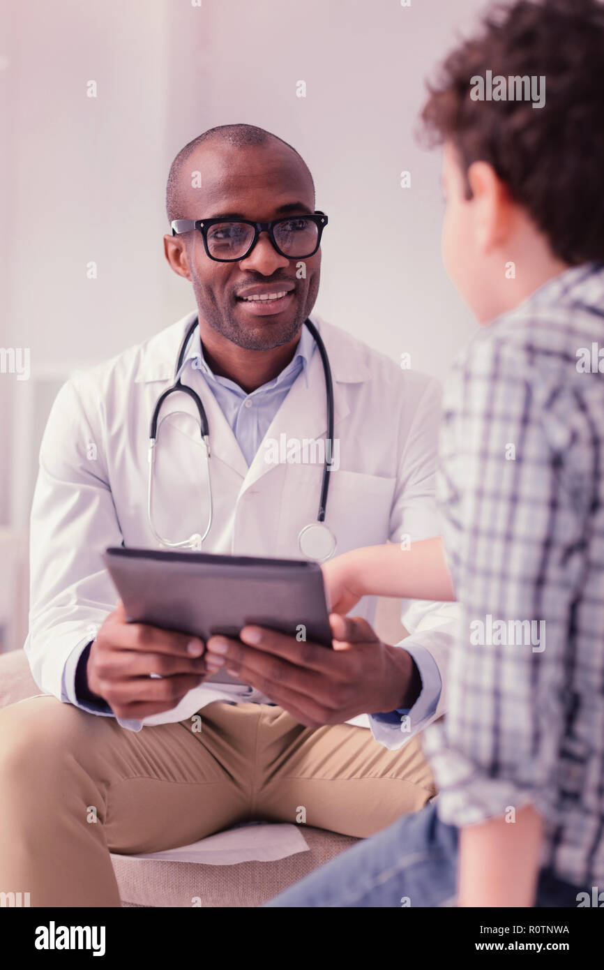 Intelligent smart male doctor using modern technology Stock Photo - Alamy