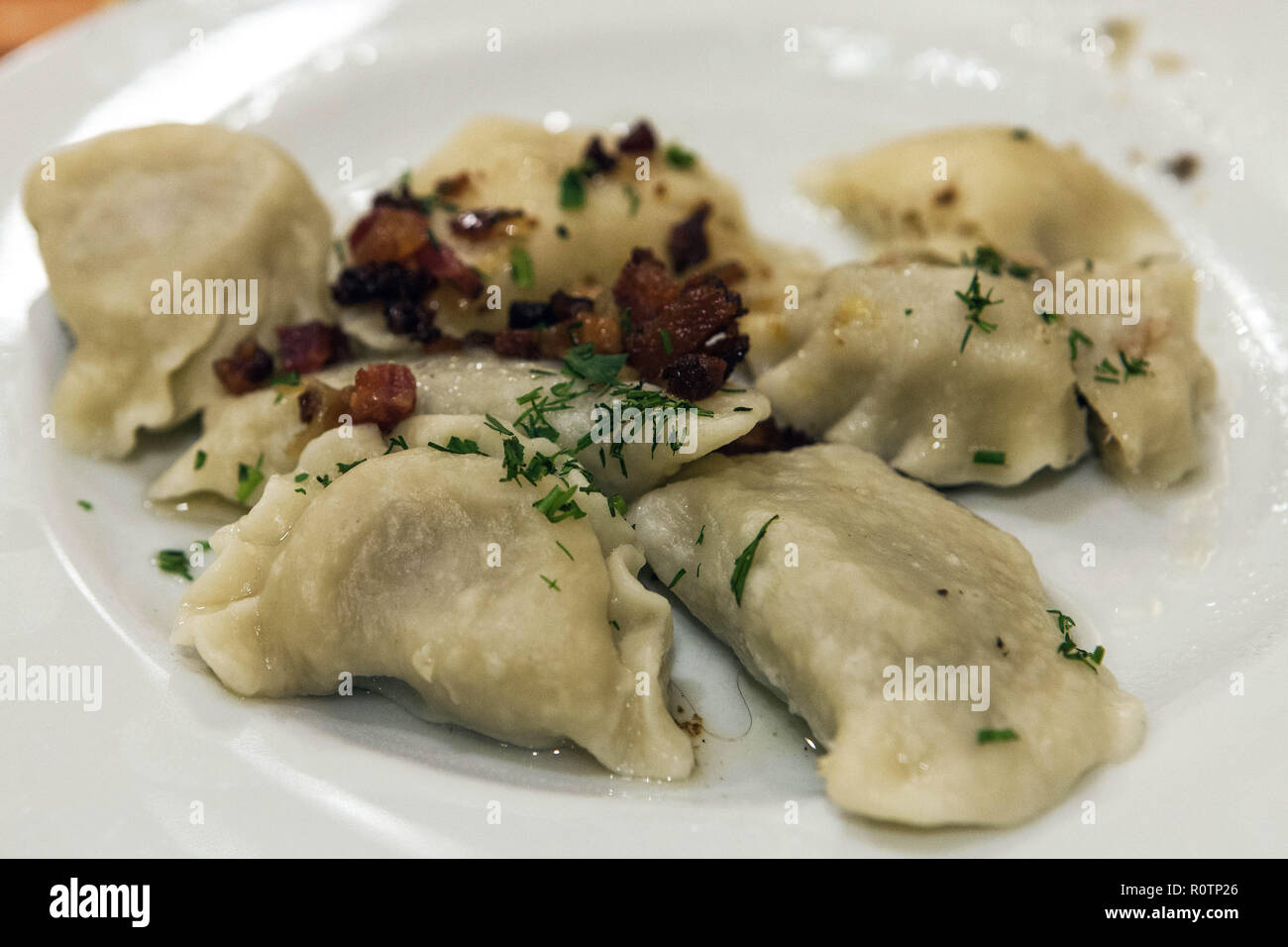 Dish of Pierogi served in a typical restaurant, Old Town Krakow, Poland ...