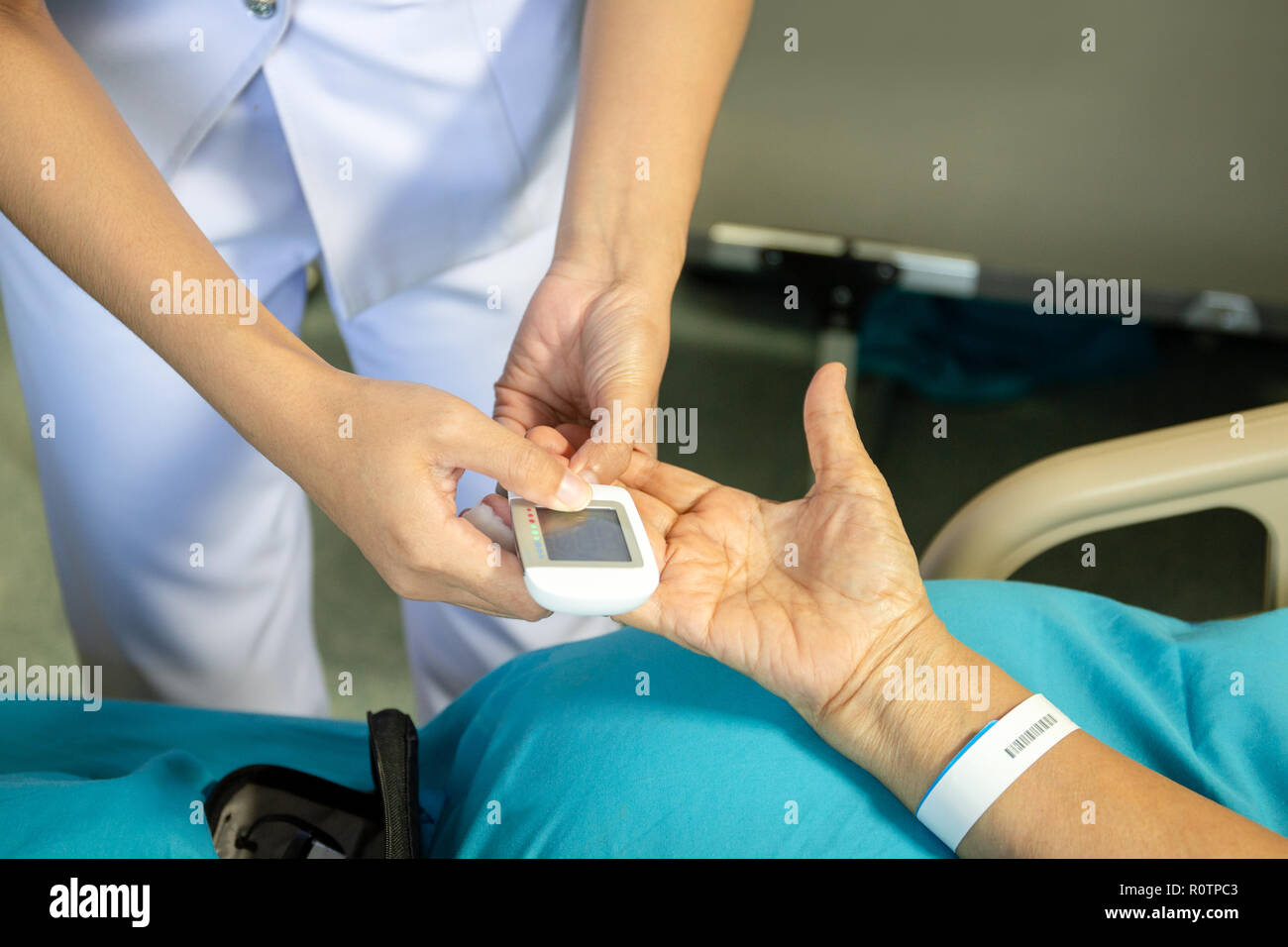 Female nurse checking insulin hi-res stock photography and images - Alamy