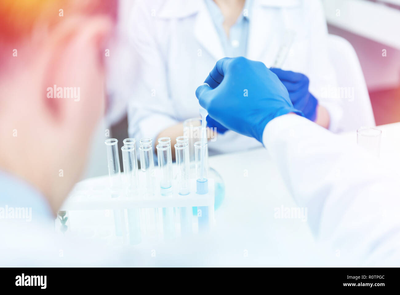 Close up of test tubes standing on the table Stock Photo - Alamy