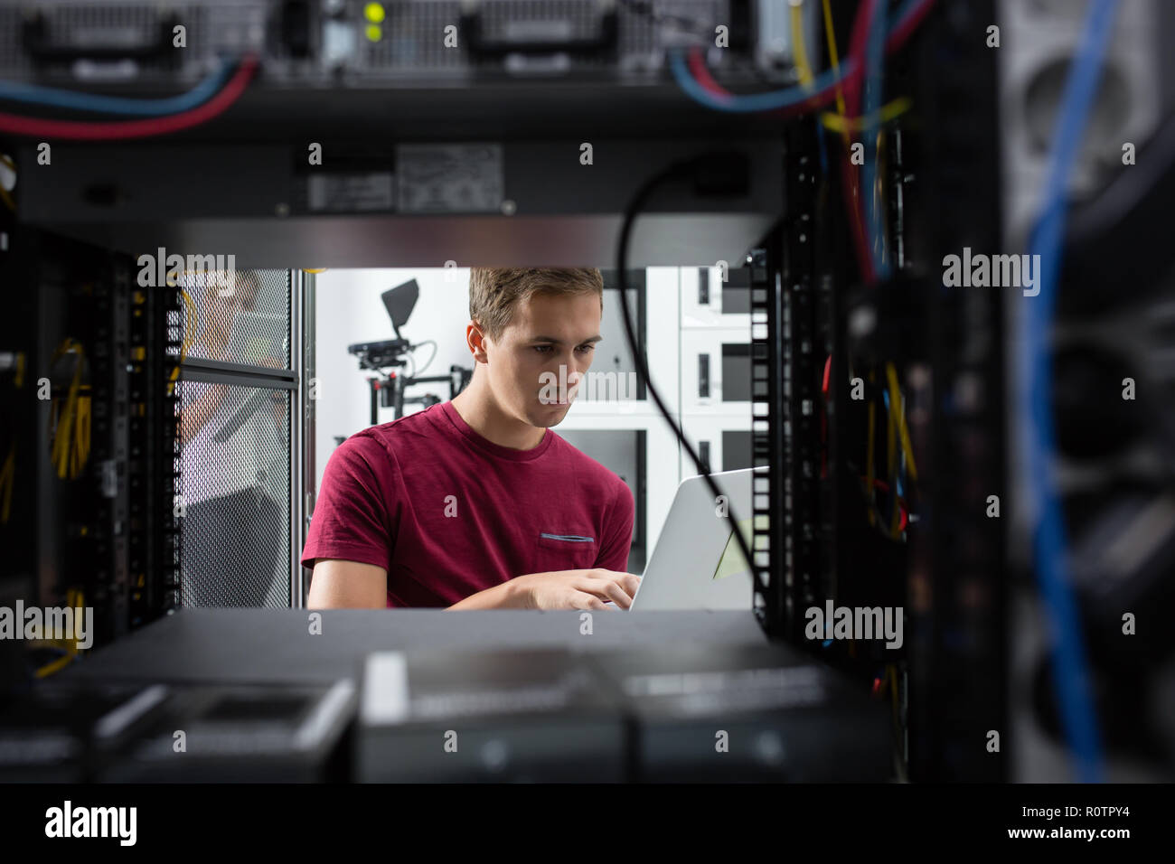 Data center specialist works in hi-res stock photography and images - Alamy