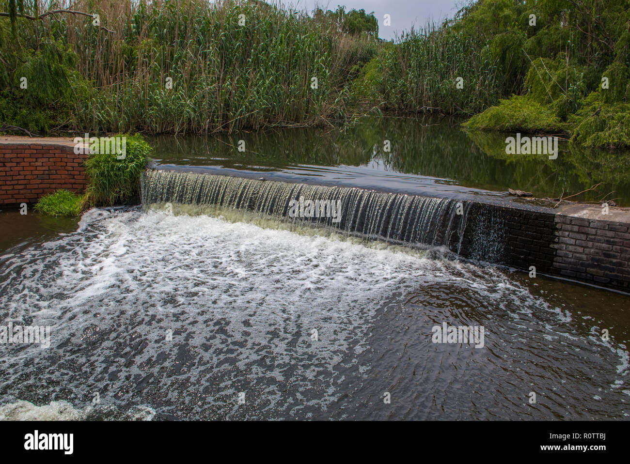 Small waterfall in the Rietvlei Nature reserve, Pretoria, South Africa ...