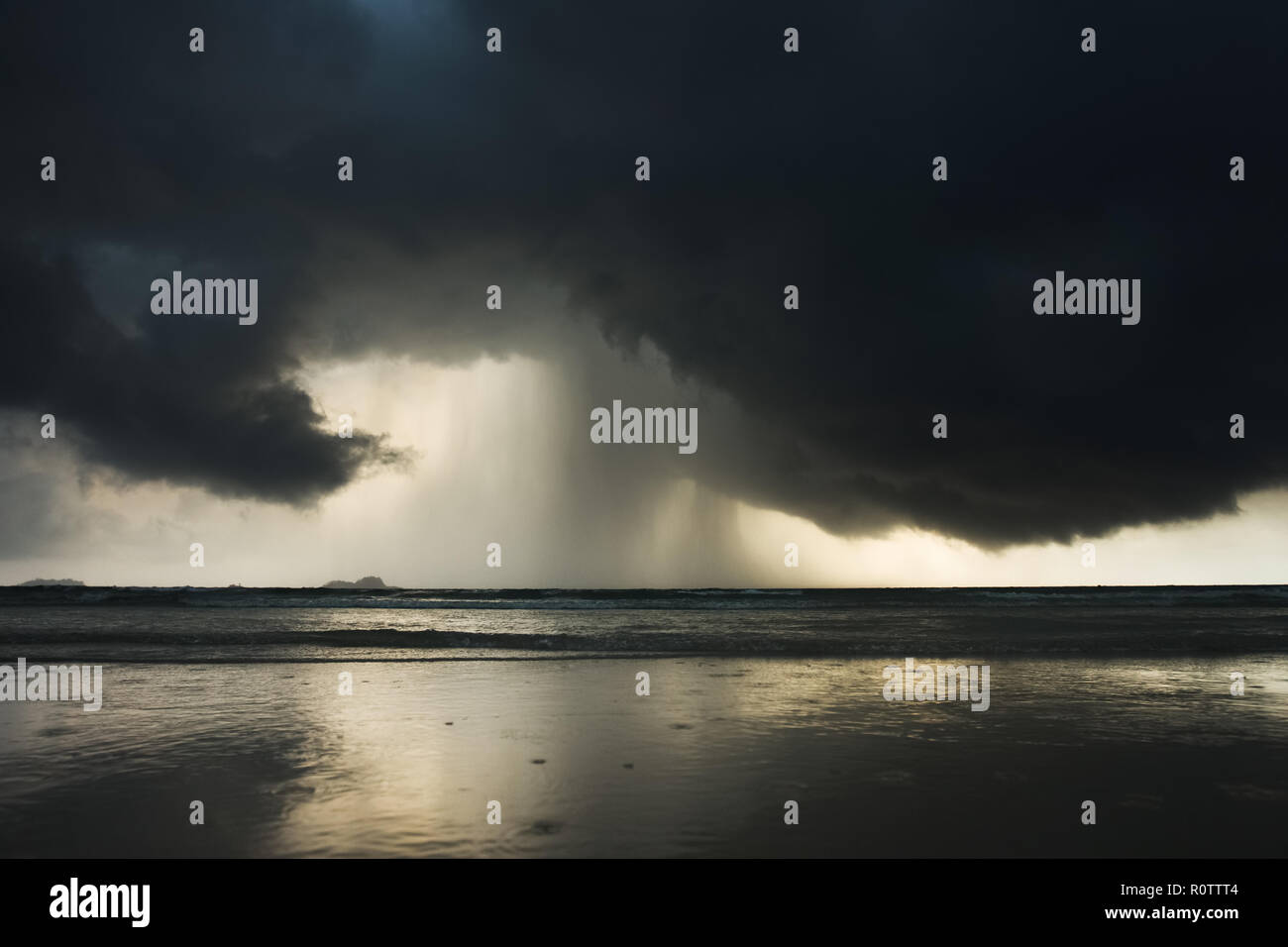 Dramatic seascape with storm and rain and dark clouds Stock Photo - Alamy