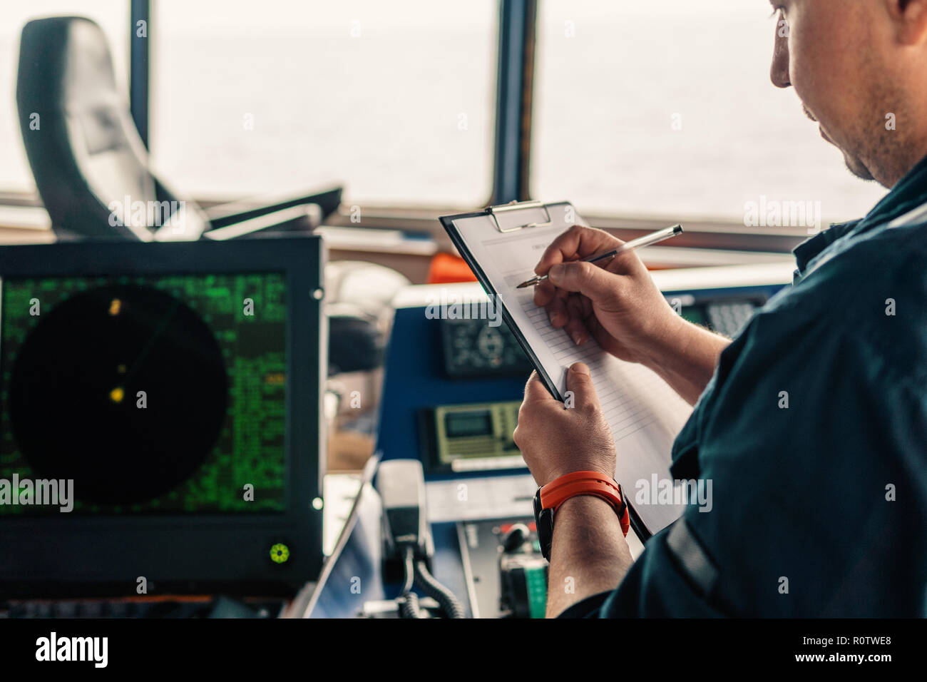 Marine navigational officer or chief mate on navigation watch Stock ...