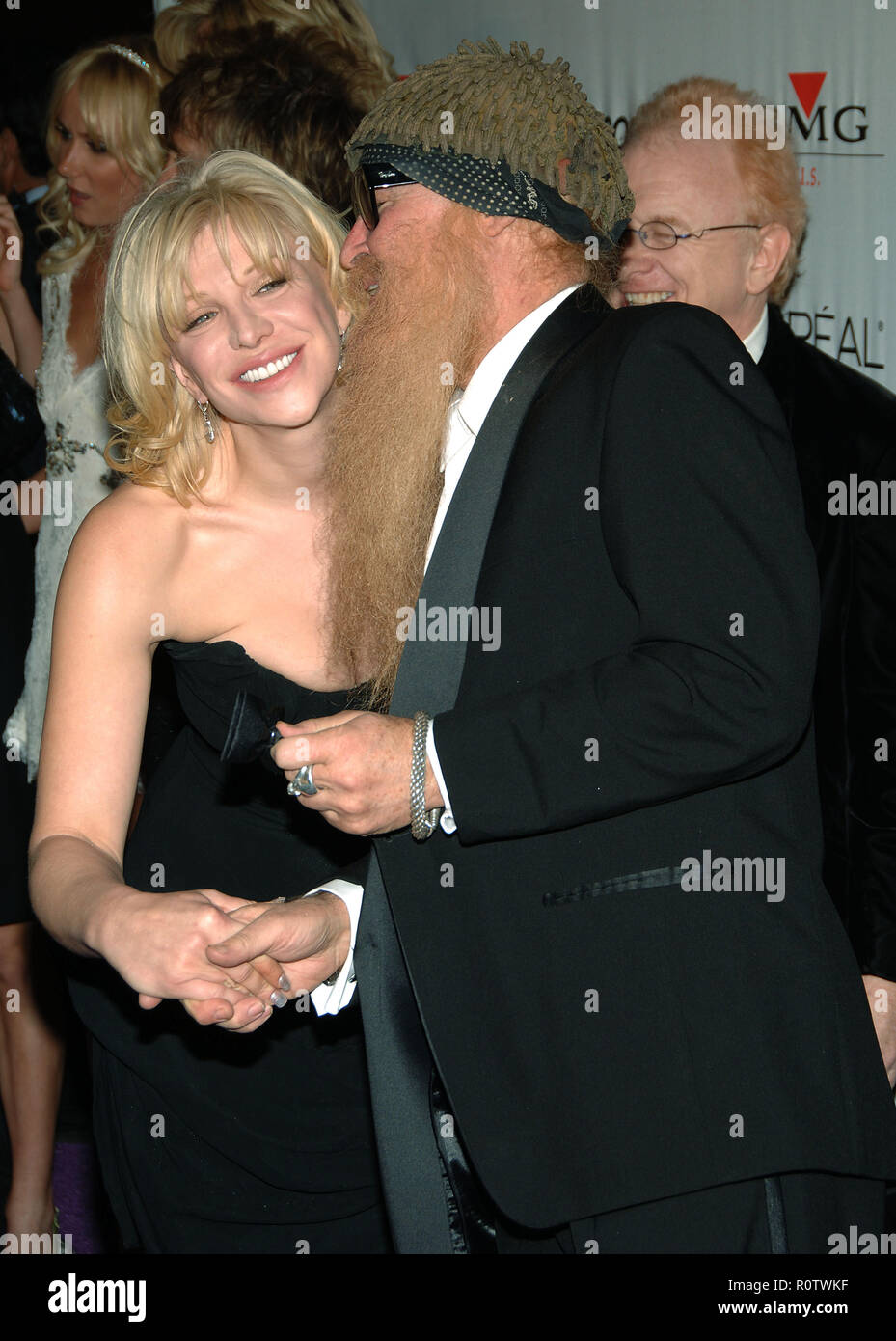 Courtney Love and ZZ Top arriving at the Clive Davis Pre-Grammys Party ...