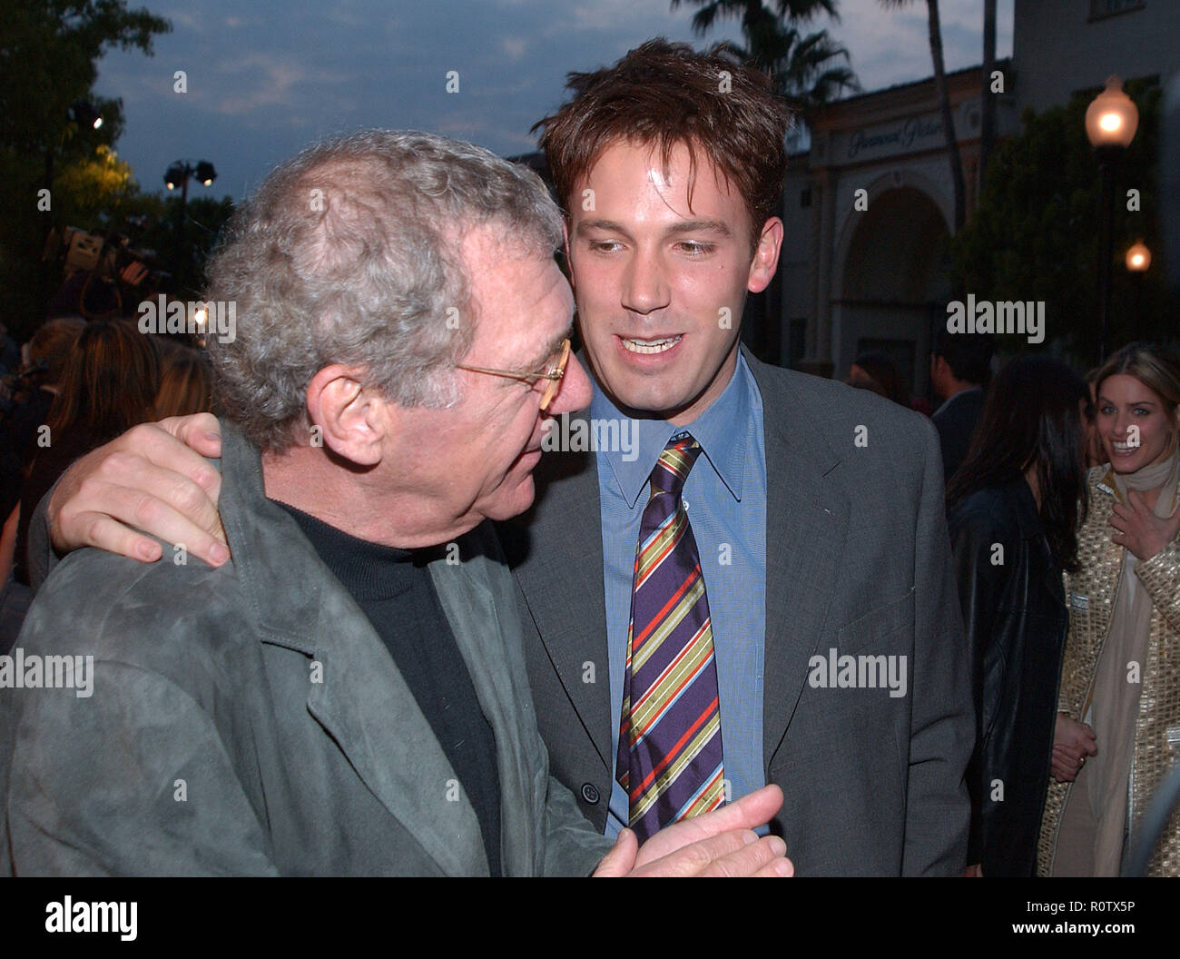 Ben Affleck and Sidney Pollack posing at the premiere of " Changing ...