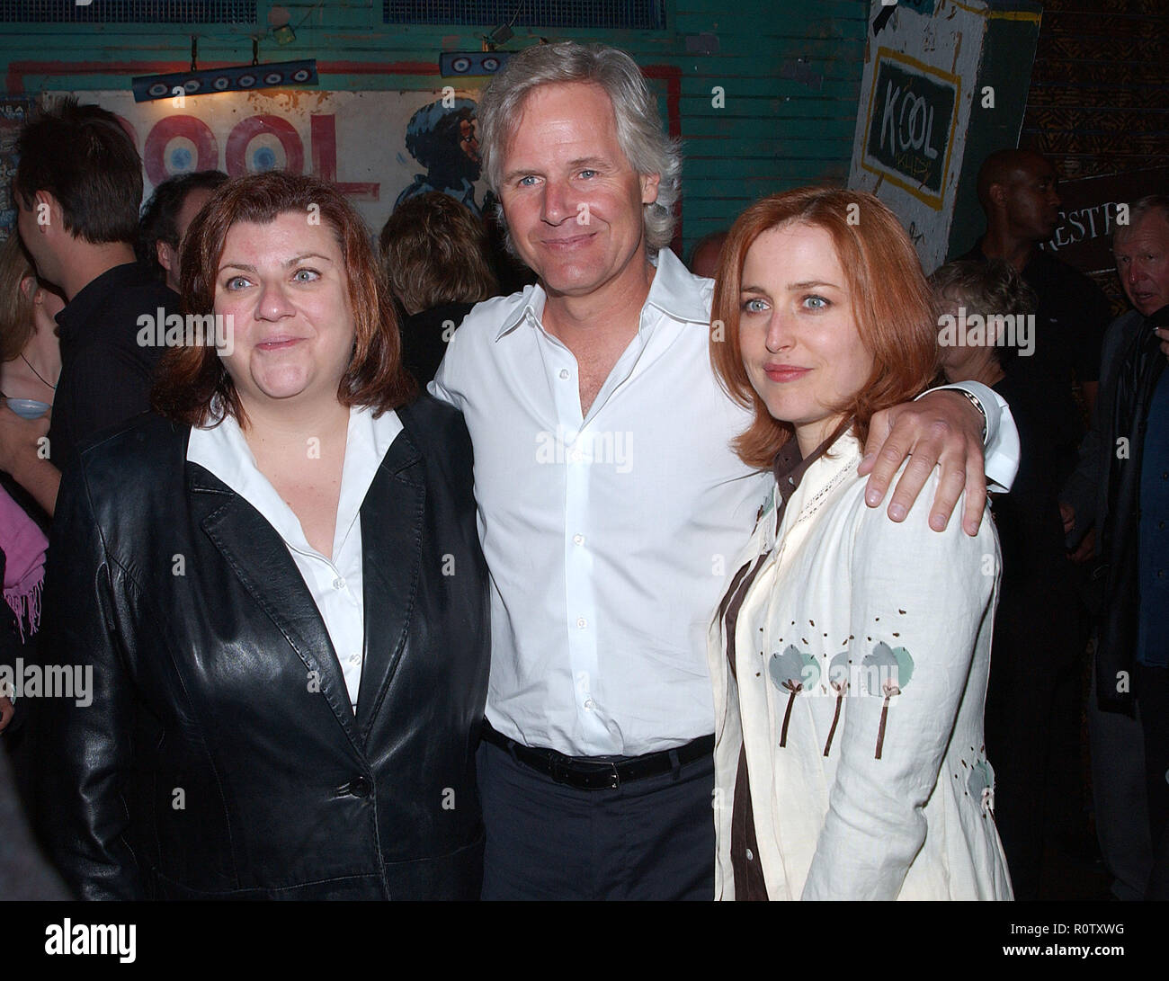 Gillian Anderson posing Chris Carter and Gail Berman (president of ...