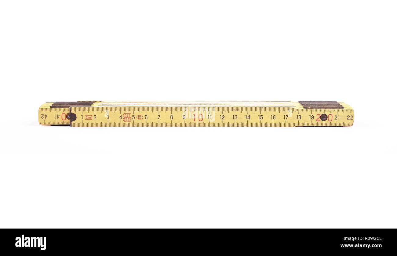 Folding rule on white background Stock Photo - Alamy