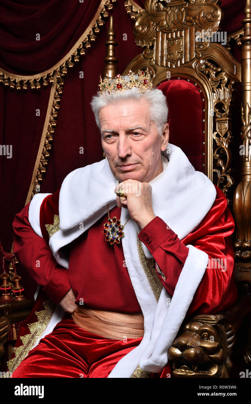 Man in red cloak hi-res stock photography and images - Alamy