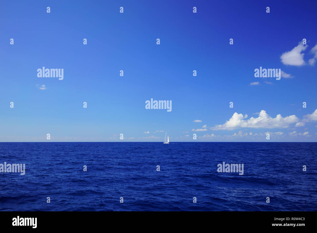 A white sailing yacht in the open waters of the Mediterranean Sea ...