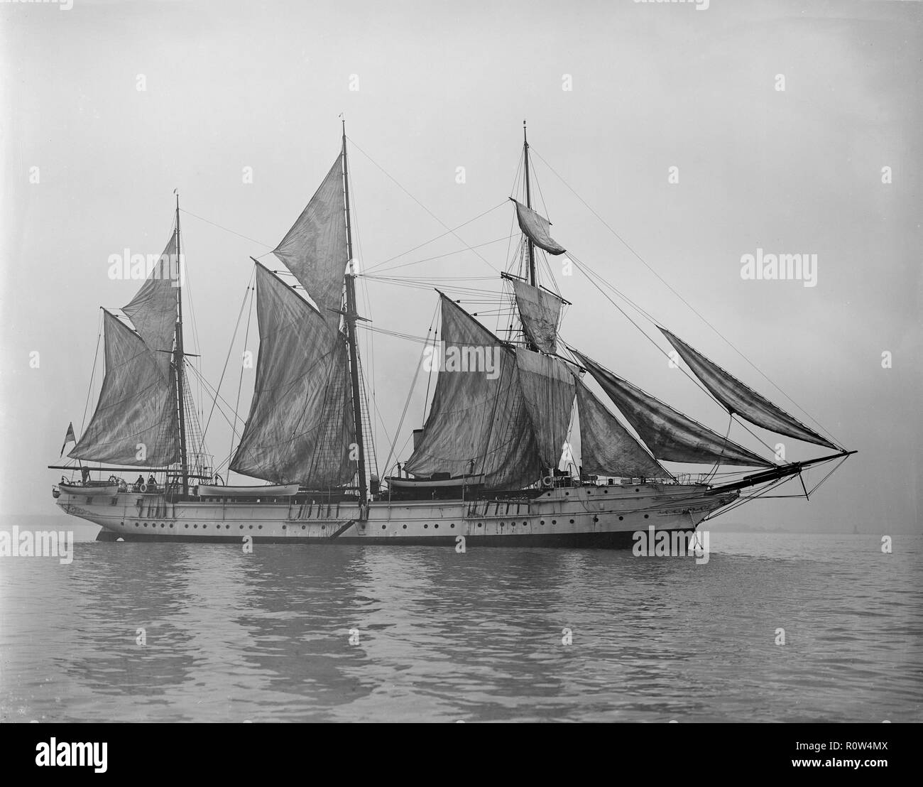 The steam yacht 'Wanderer' (later named 'Vagus') hoisting sails ...