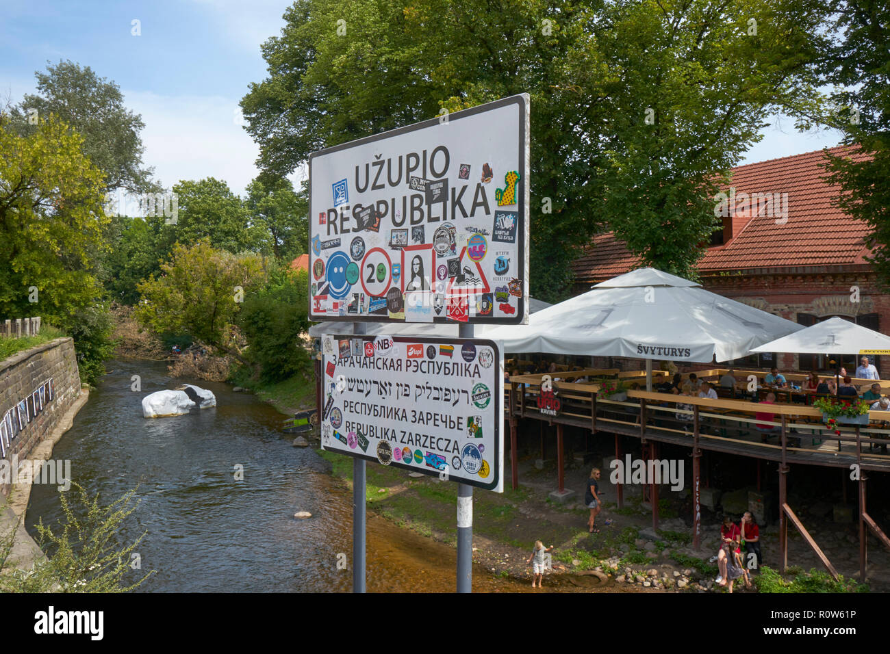 Sreet sign for Uzupio Republic, Uzupis, Vilnius, Lithuania with river ...