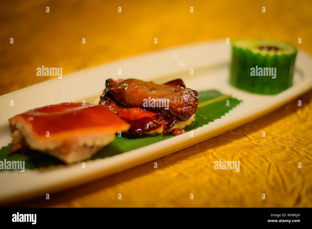 Roasted suckling’s pig and sliced chicken liver Stock Photo - Alamy