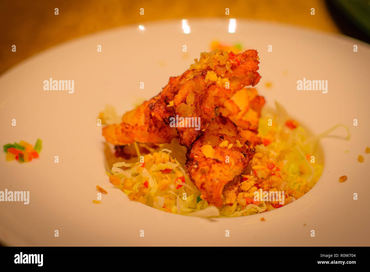 Fried little yellow croaker fish with salt and chili pepper Stock Photo ...