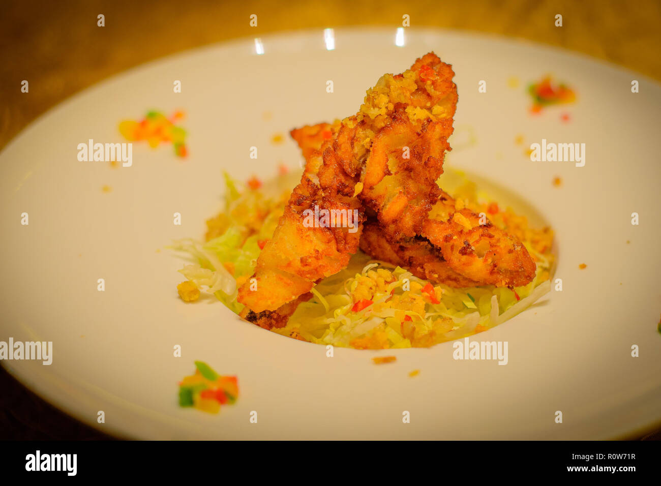 Fried little yellow croaker fish with salt and chili pepper Stock Photo ...