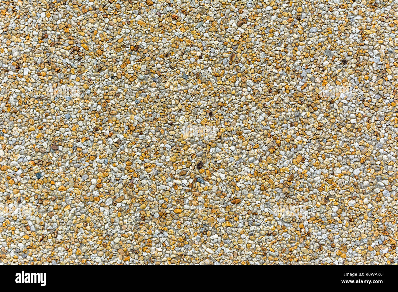 Wall of small stones texture background, natural gravel background ...