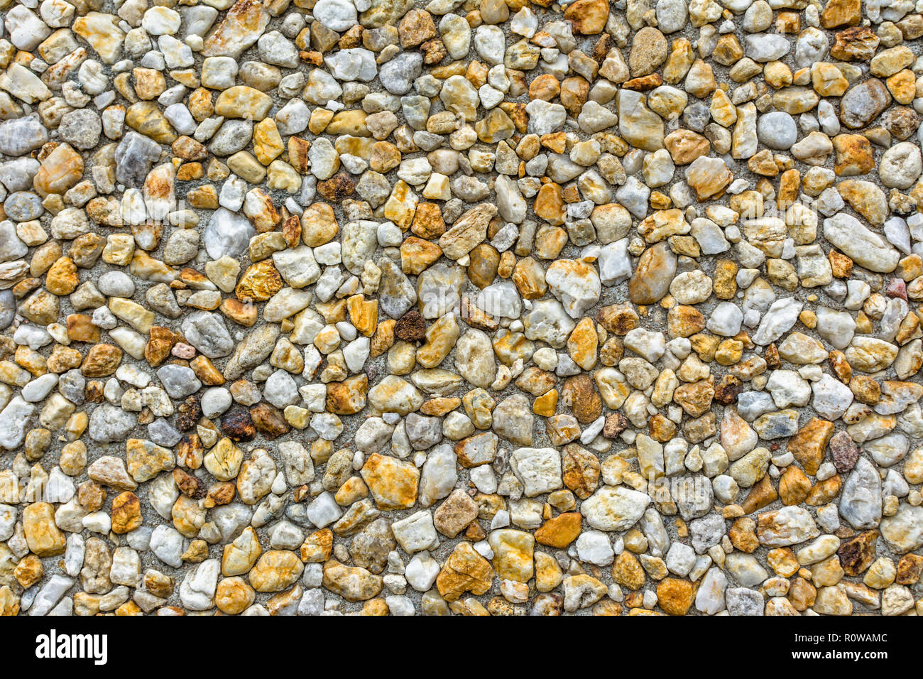 Wall of small stones texture background, natural gravel background ...