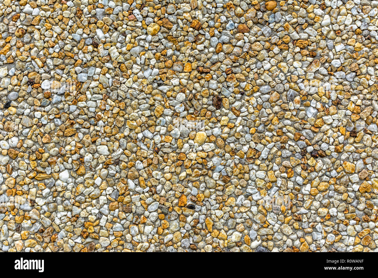 Wall of small stones texture background, natural gravel background ...