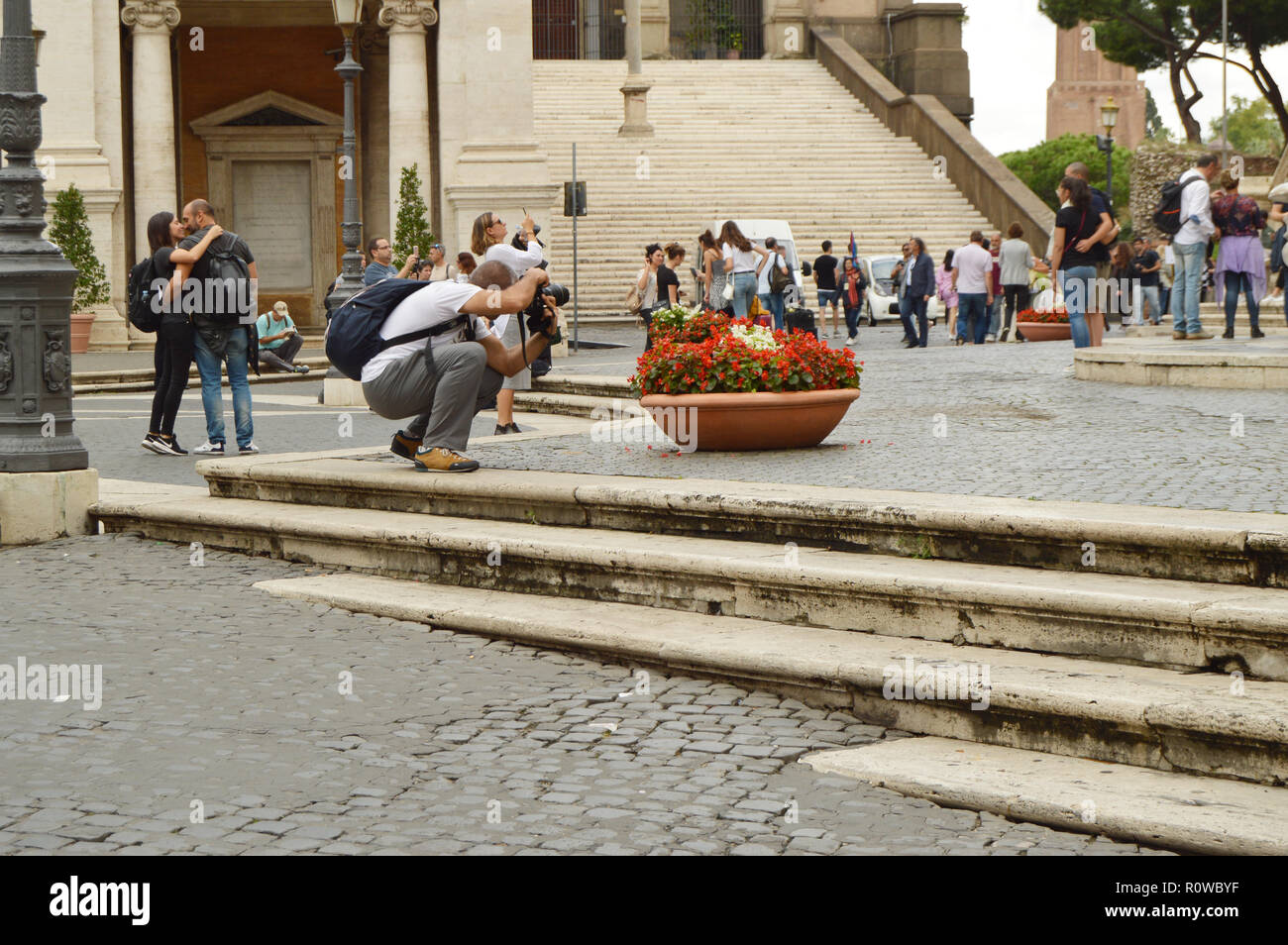 Tourists take pictures of attractions on Capitol hill, Rome, Italy ...