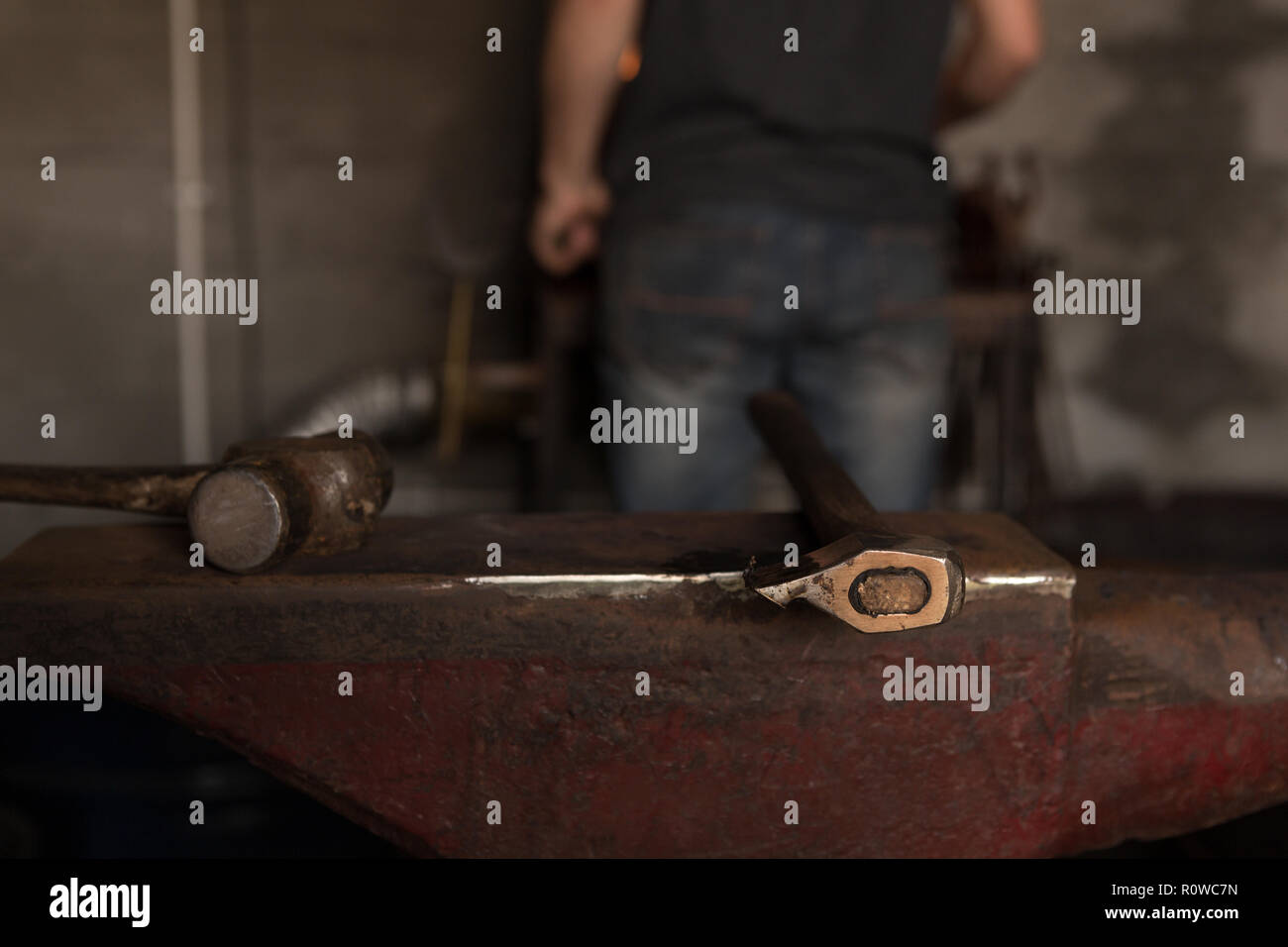 Tools kept on anvil in factory Stock Photo - Alamy