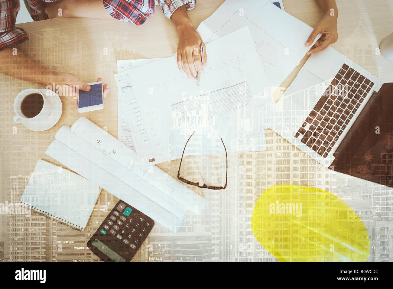 Engineering project accessories on desk in construction site or office ...