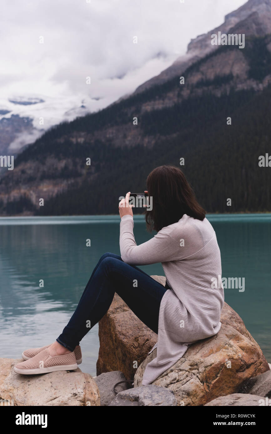 Woman clicking photos nature hi-res stock photography and images - Alamy