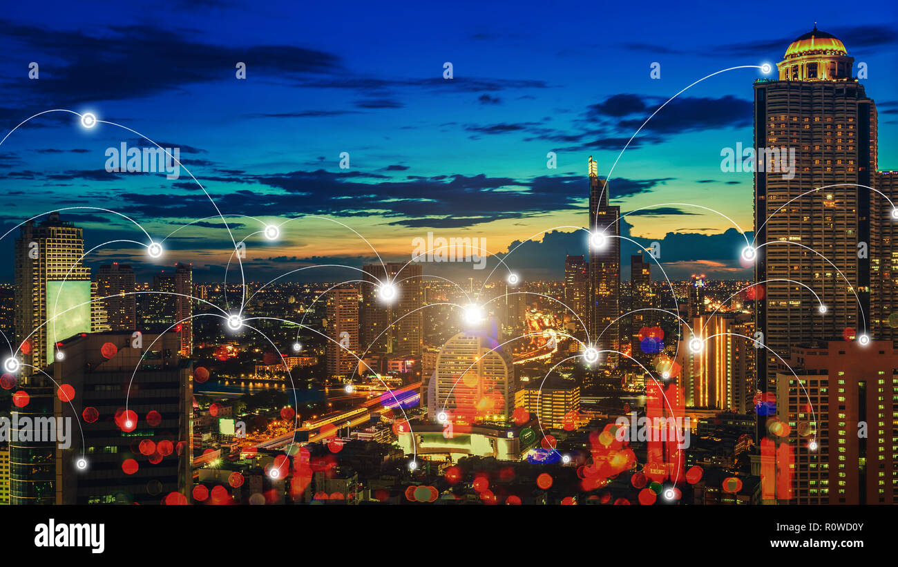 Skyscraper night city with connection icons. Smart communication in ...