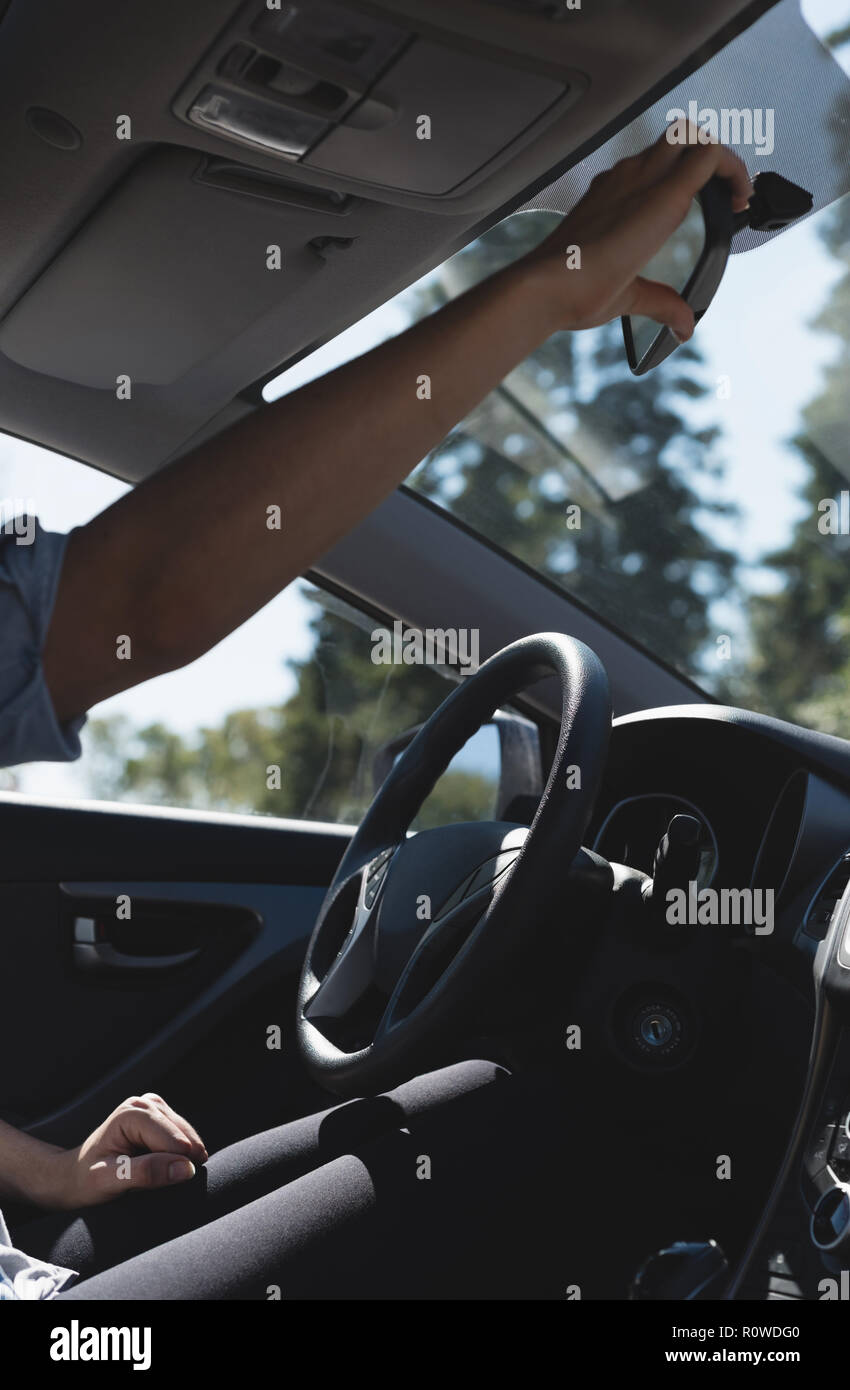Adjusting the rear view mirror of a car hi-res stock photography and ...
