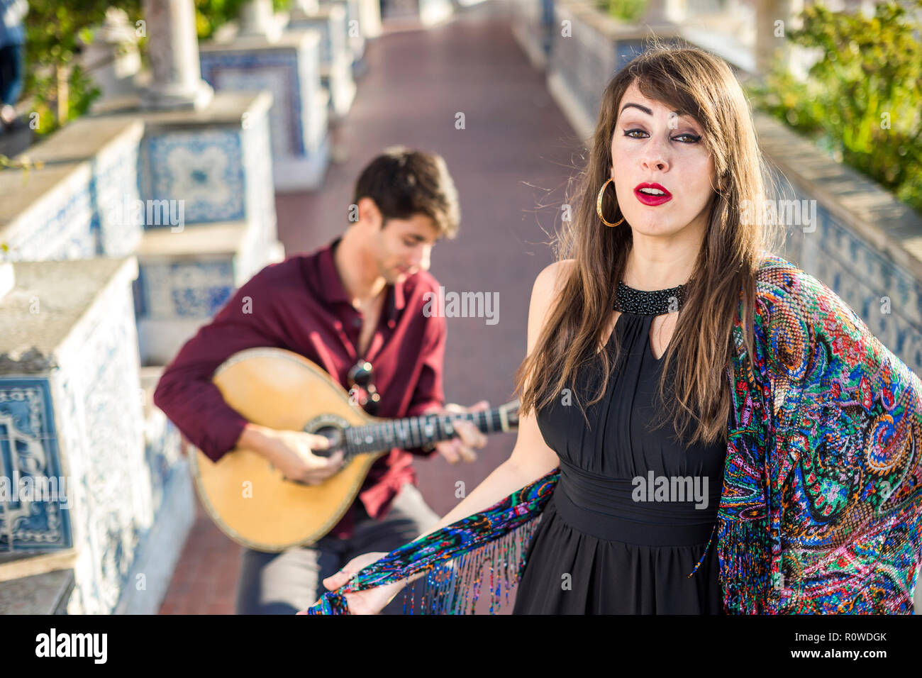 Band performing traditional music fado under pergola with portuguese ...